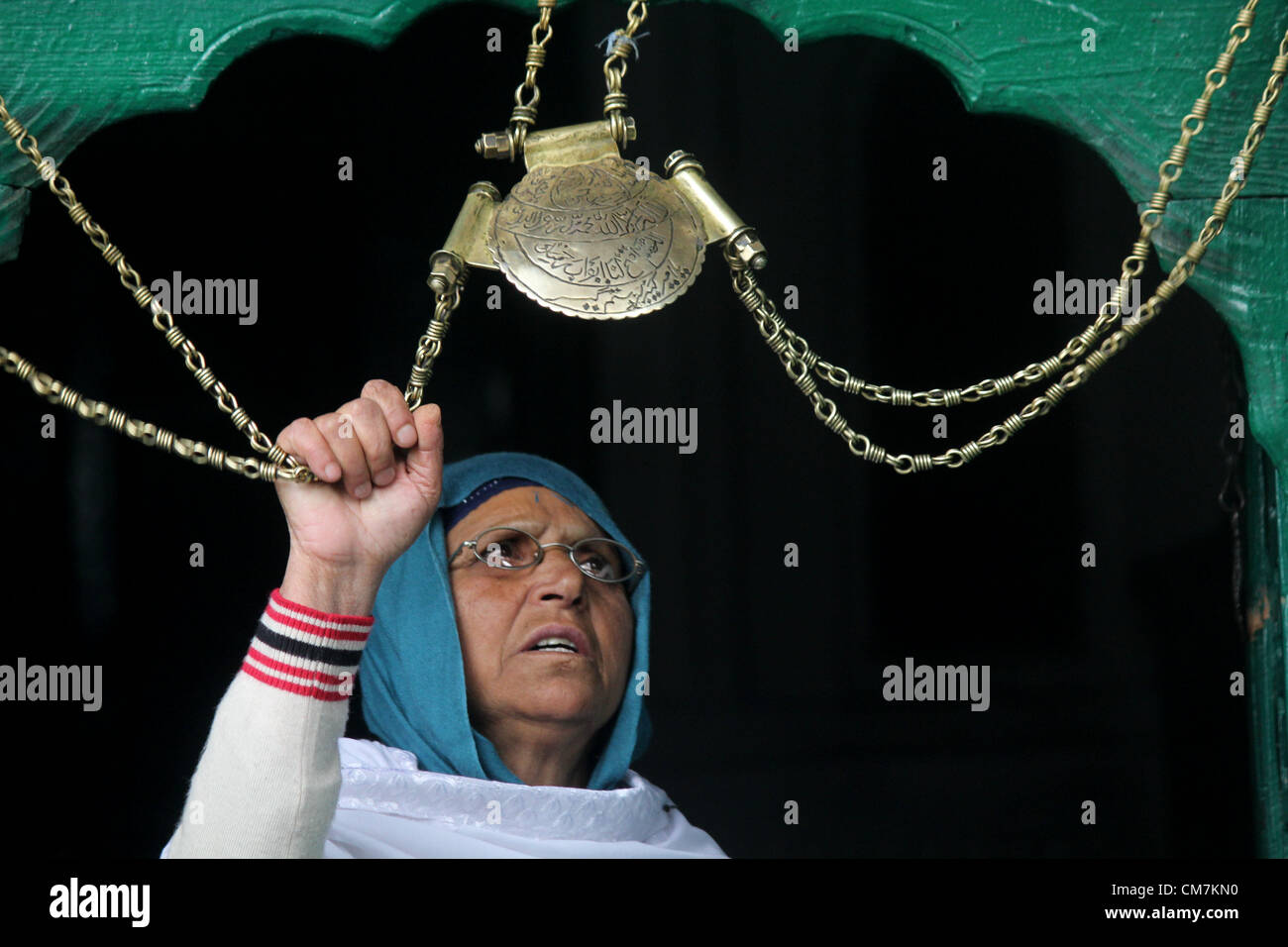 Oct. 23, 2012 - Kashmiri Muslim women touch with holy chan inside the ...