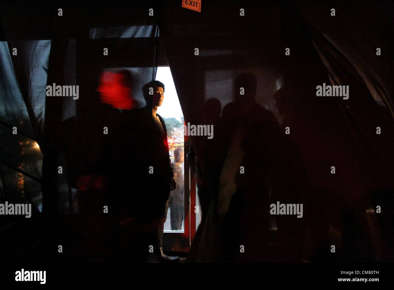 JOHANNESBURG, SOUTH AFRICA – OCTOBER 24: Models back stage during the ...