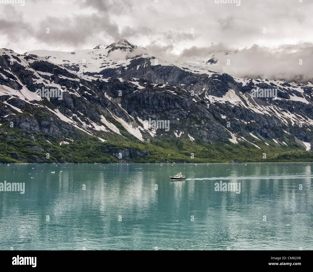 July 3, 2012 - Glacier Bay, Alaska, US - A sightseeing cabin cruiser ...