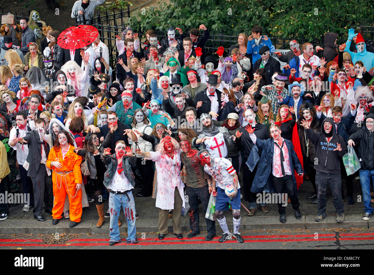 London, UK. 27th October 2012. People dressed up as zombies celebrating ...