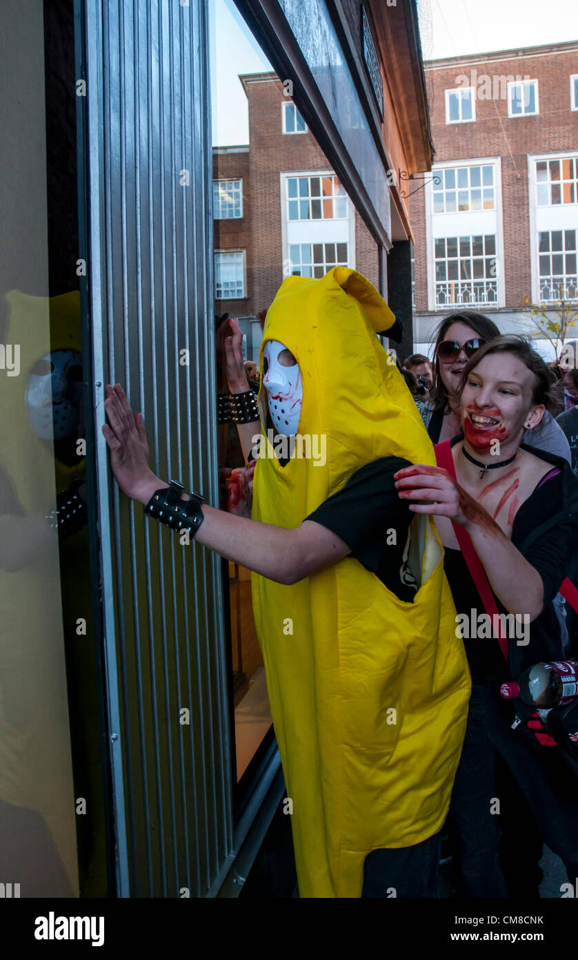 27th October 2012. Zombies try to break into a shop during the Exeter ...