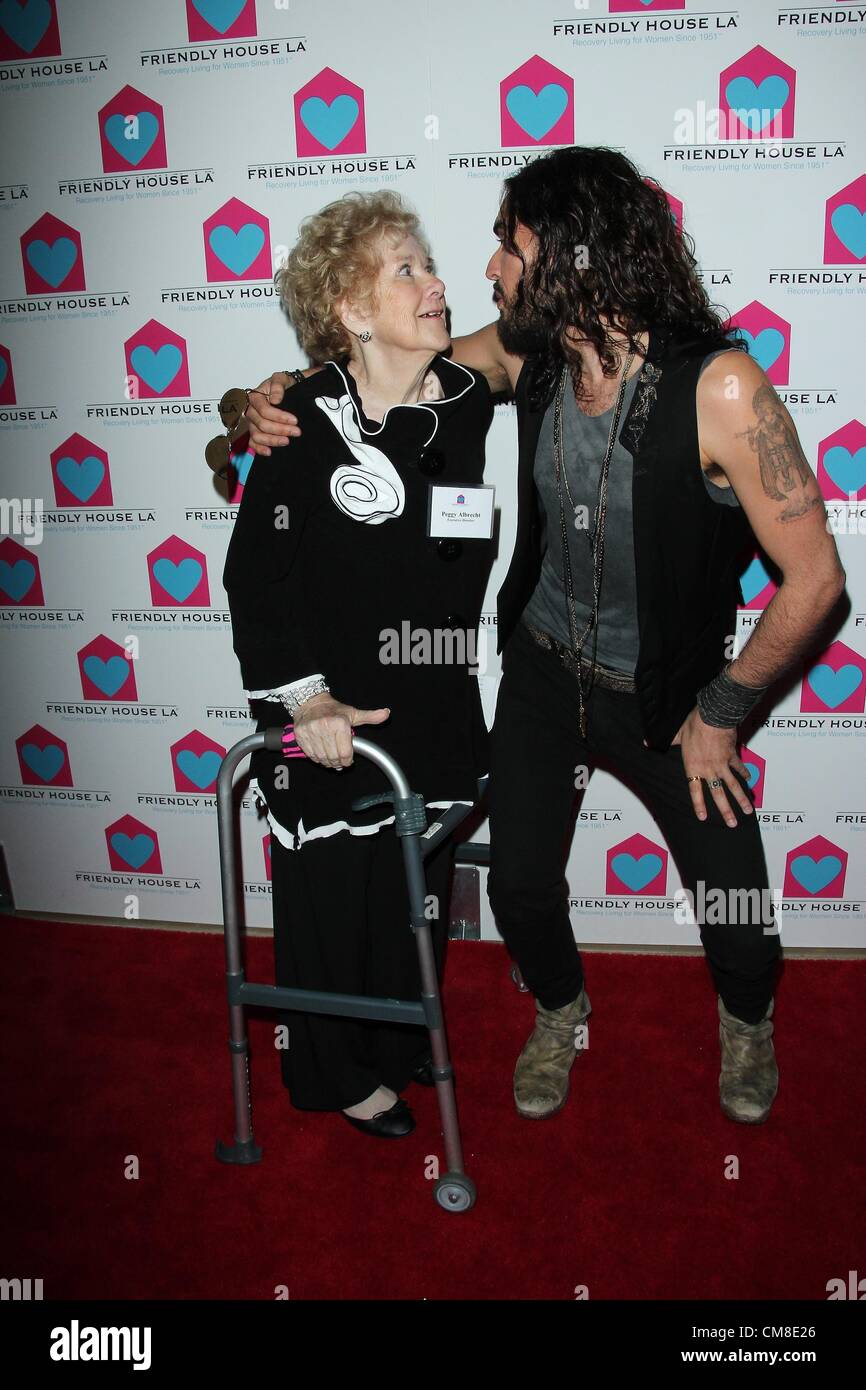 Russell brand peggy albrecht friendly hi-res stock photography and ...