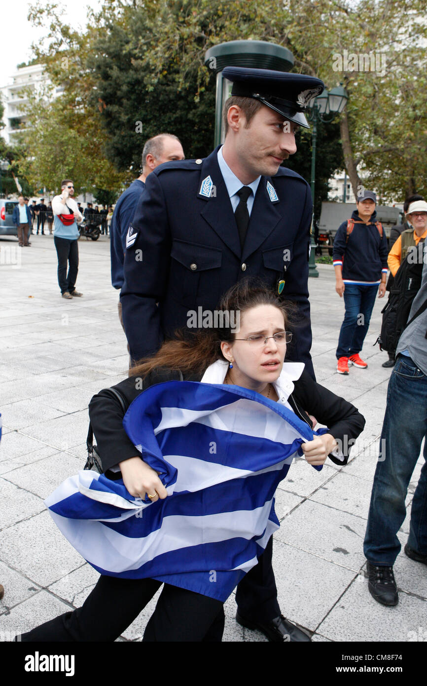 Oct. 28, 2012 - Athens, Greece - Police arrest a woman because she ...