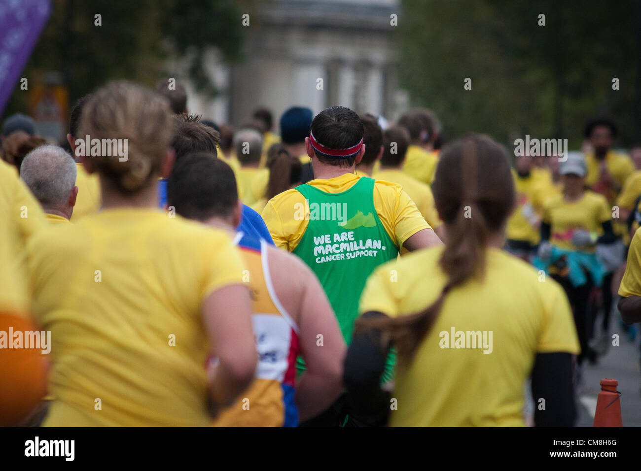 London, UK, Sunday 28th October 2012. A runner supporting Macmillan ...