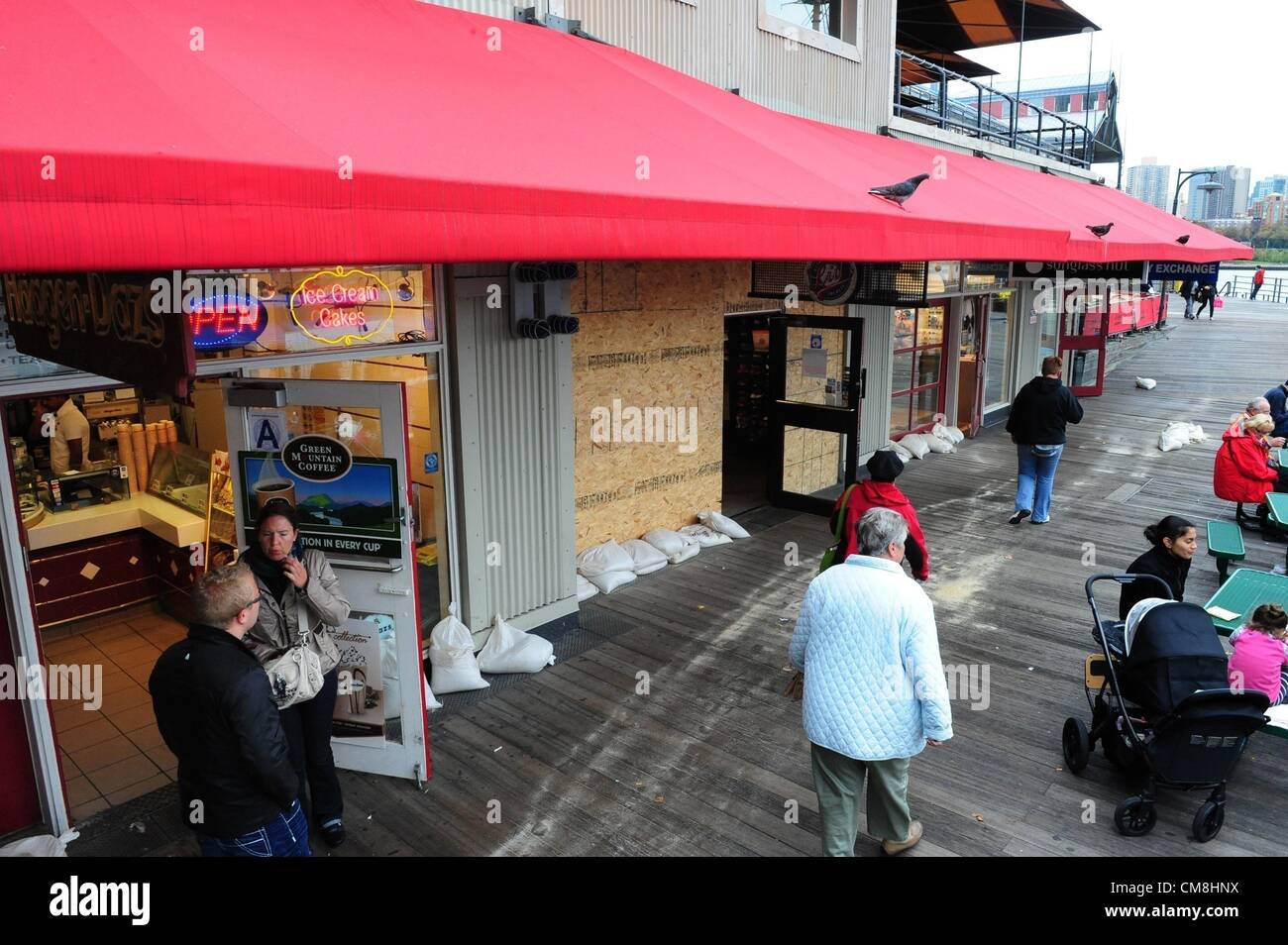 Manhattan, New York, U.S. - Sandbags and boarded up windows at South ...
