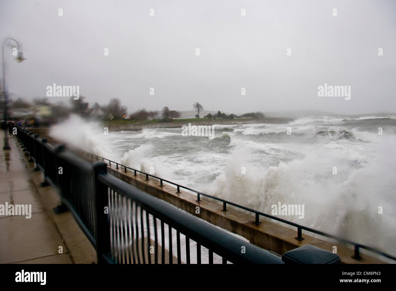 large waves generated by Hurricane Sandy slam into a seawall. Lynn ...