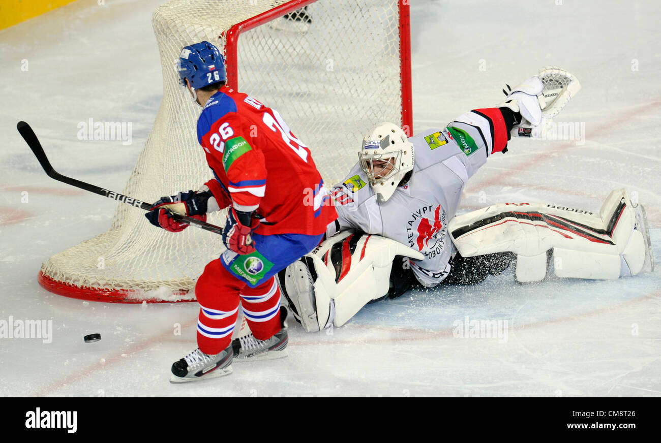 Michal Repik of Lev Praha, left, and Alexander Lazushin, goalkeeper of ...