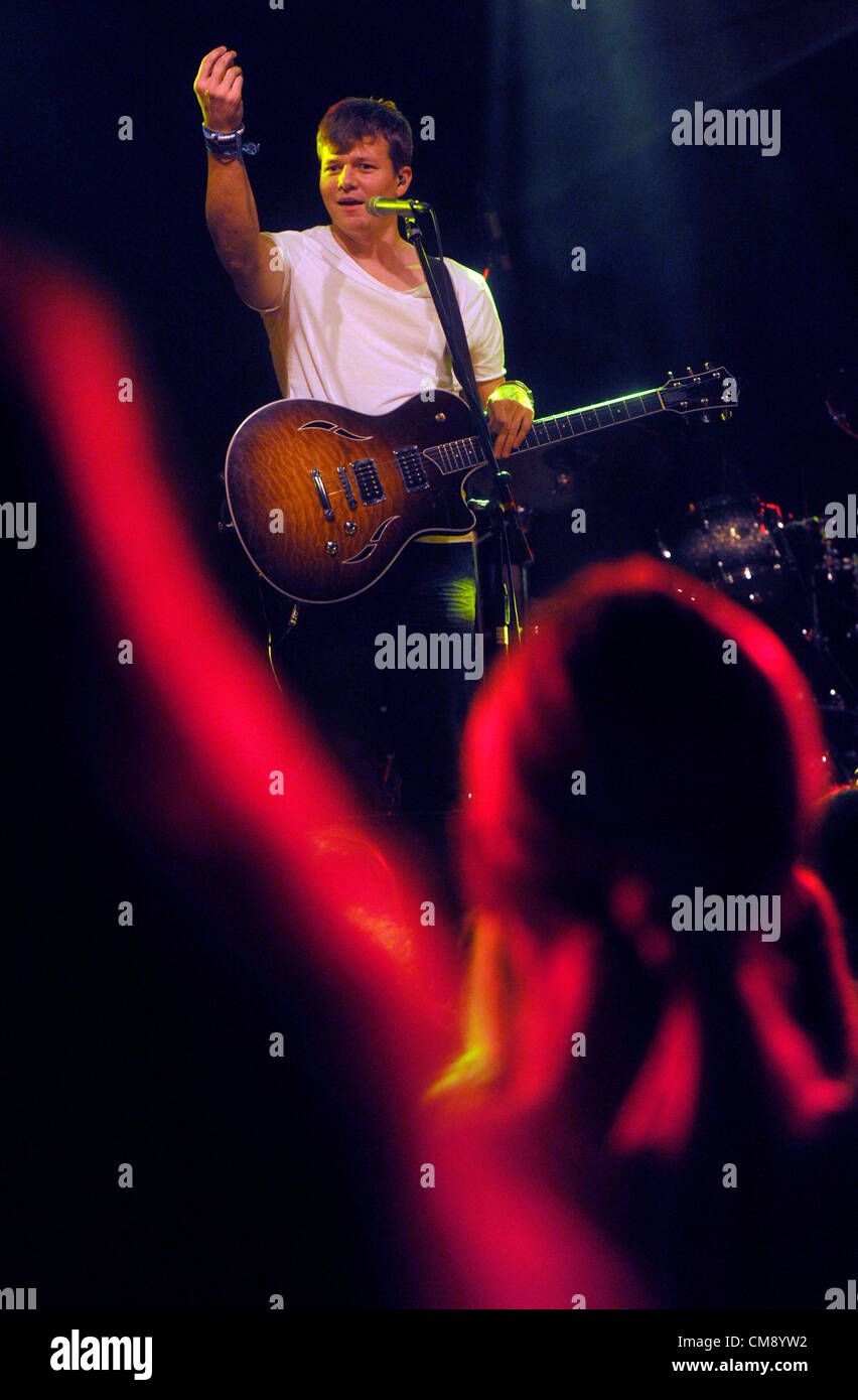 American singer/songwriter and producer Tyler Ward (left) performs in ...