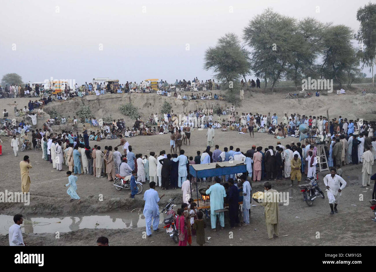 A large number of people gather to watch traditional wrestling Malh on ...