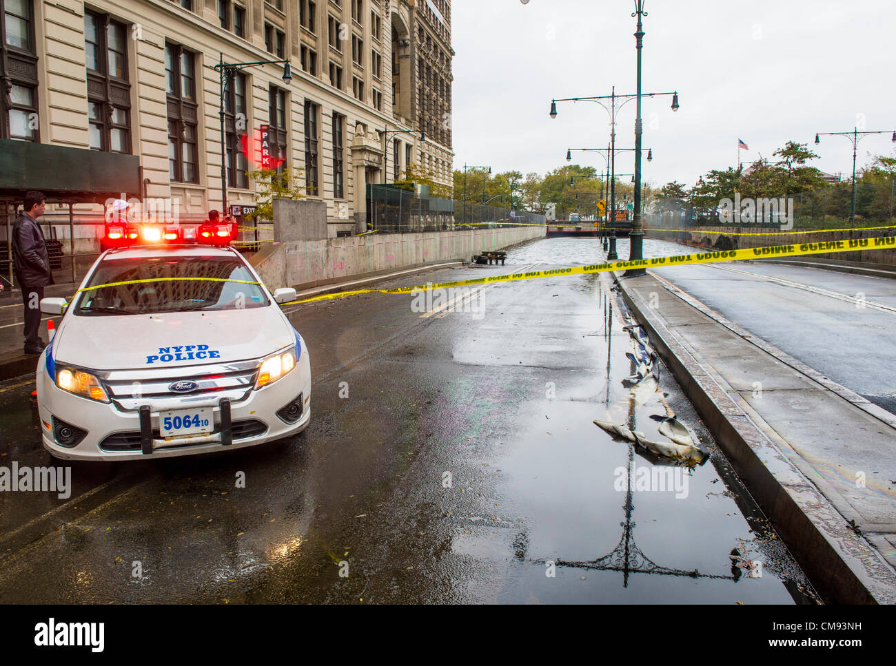 NEW YORK - OCT 30 : Flooded road at downtown Manhattan as Hurricane ...