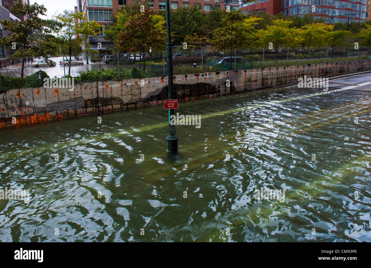 NEW YORK - OCT 30 : Flooded road at downtown Manhattan as Hurricane ...