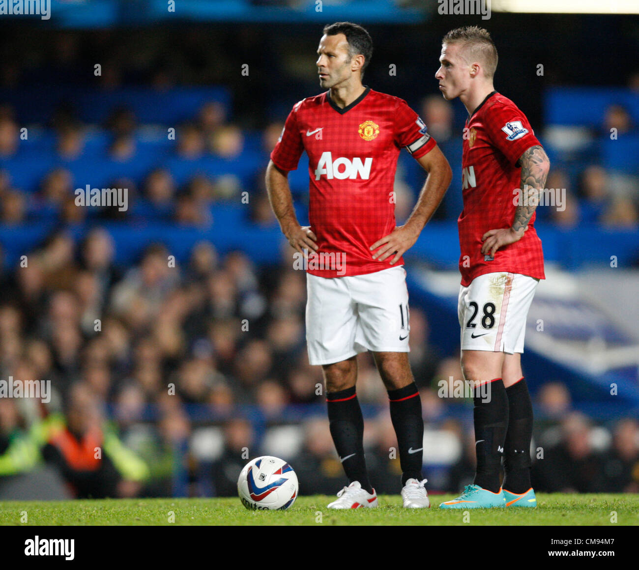 31.10.2012.London, England. Ryan Giggs and Alexander Buttner of ...
