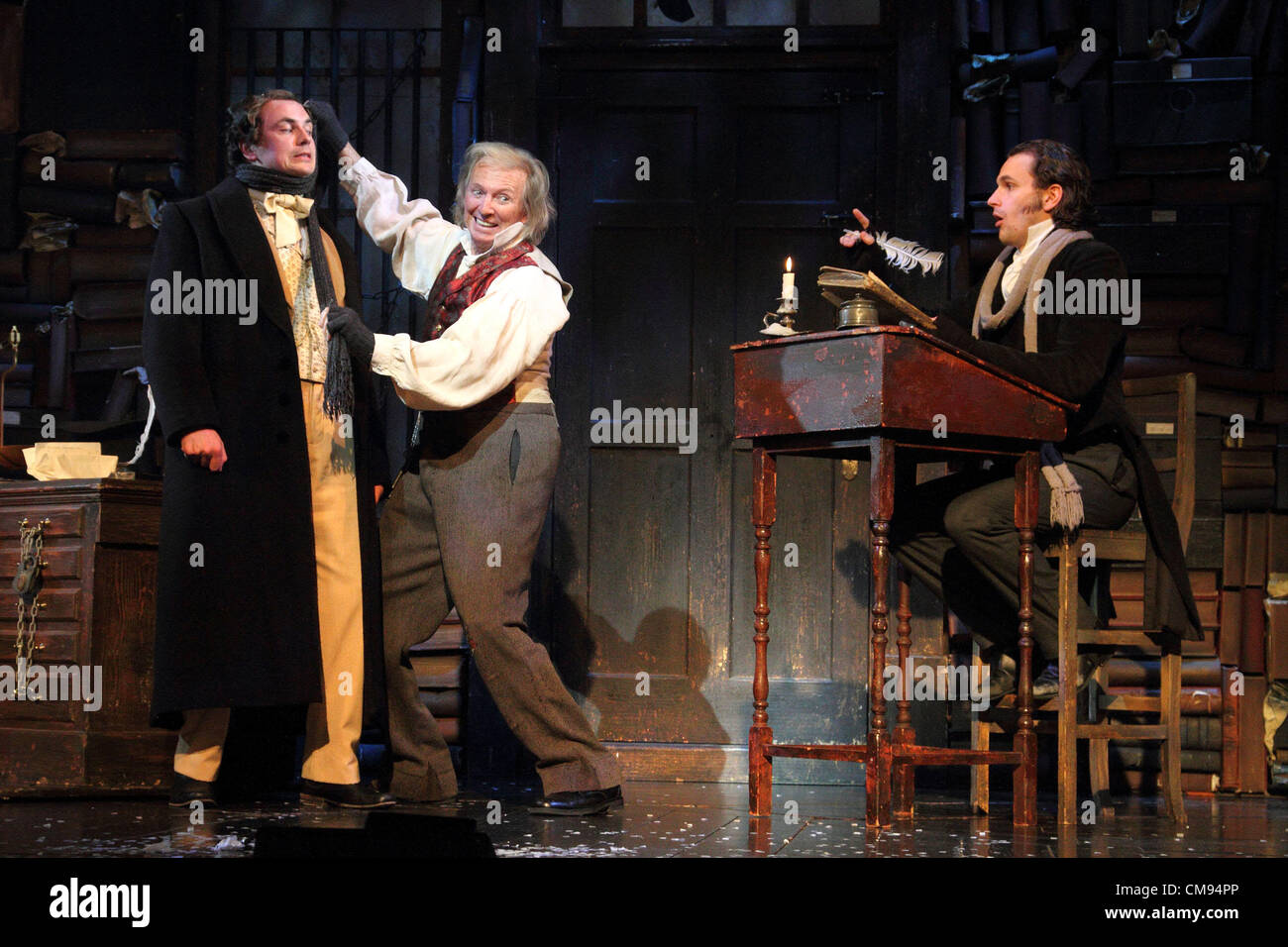 Pictured - Tommy Steele as Ebenezer Scrooge and Craig Whitely as Harry ...