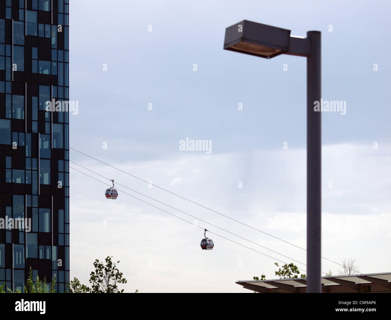 Cars start operating at the opening of the Emirates Air Line urban ...