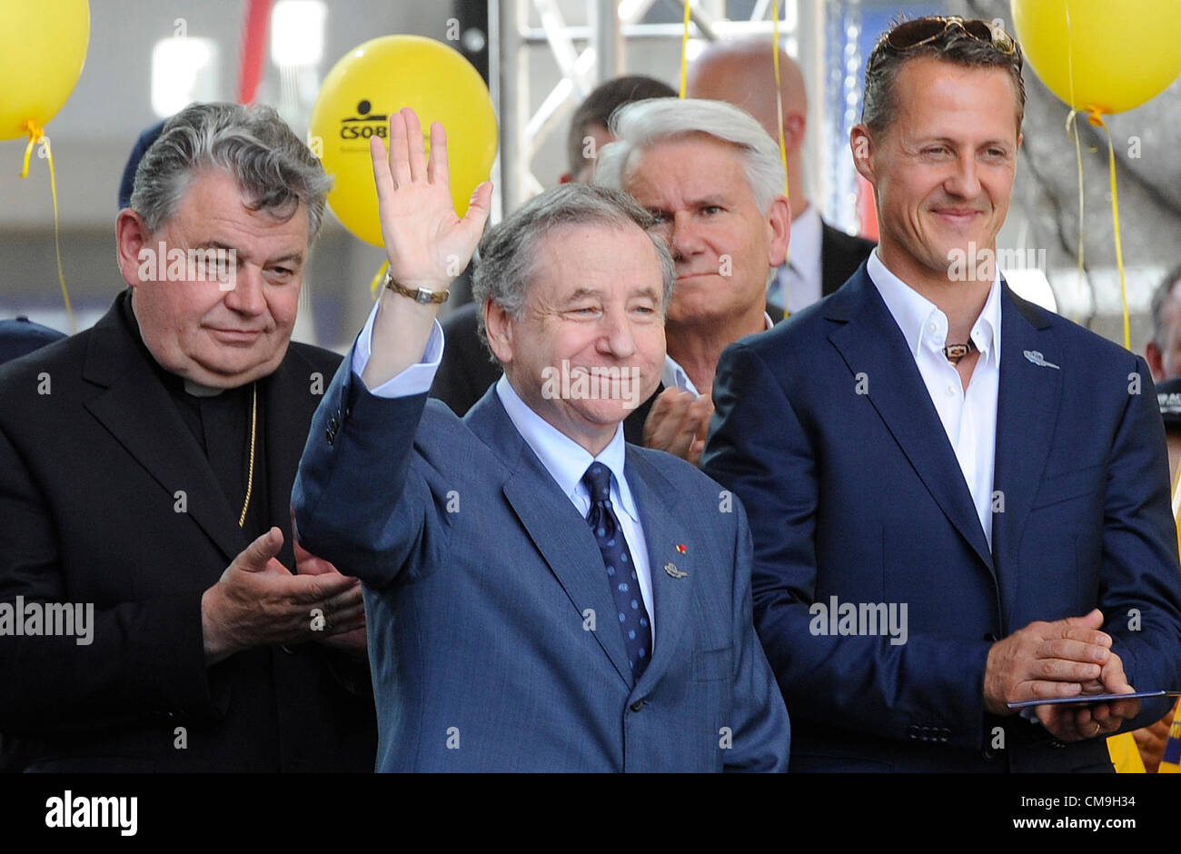Left to right: cardinal Dominik Duka, FIA President Jean Todt and ...