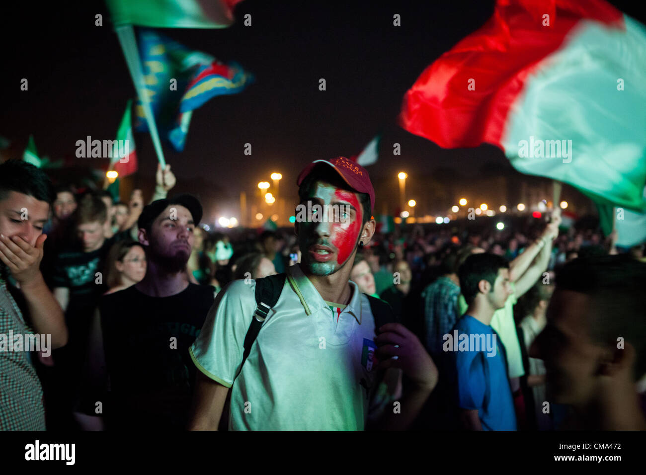 Italy's football fans watch the match on the giant screen at the Circo ...