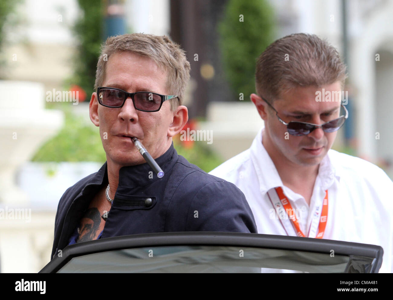 Danish actor Thomas Bo Larsen, left, is seen after his arriving to the ...