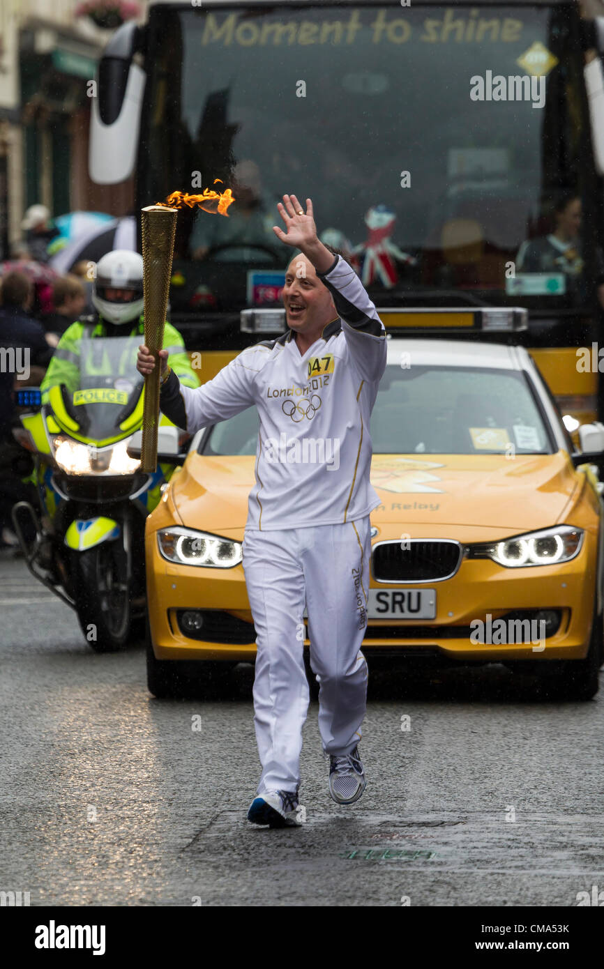Northampton UK. 2nd July 2012. Andy Wightman carries The Olympic torch ...
