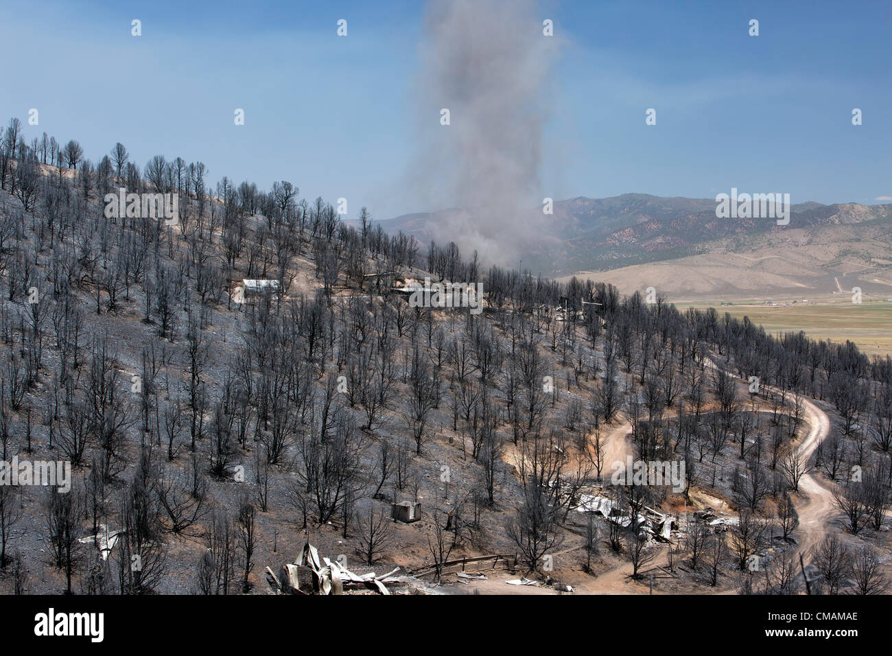 Wildfire and forest fire destroys 50,000 acres of mountain and cabin ...