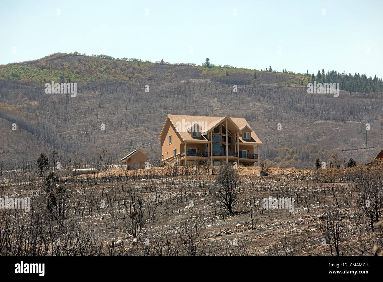 Wildfire and forest fire destroys 50,000 acres of mountain and cabin ...