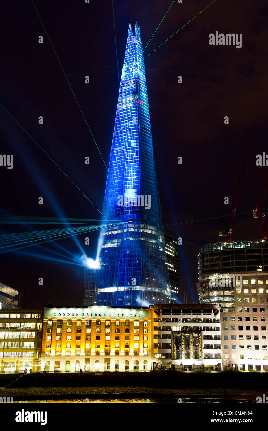 The Shard is illuminated with lasers and lights to mark its completion ...