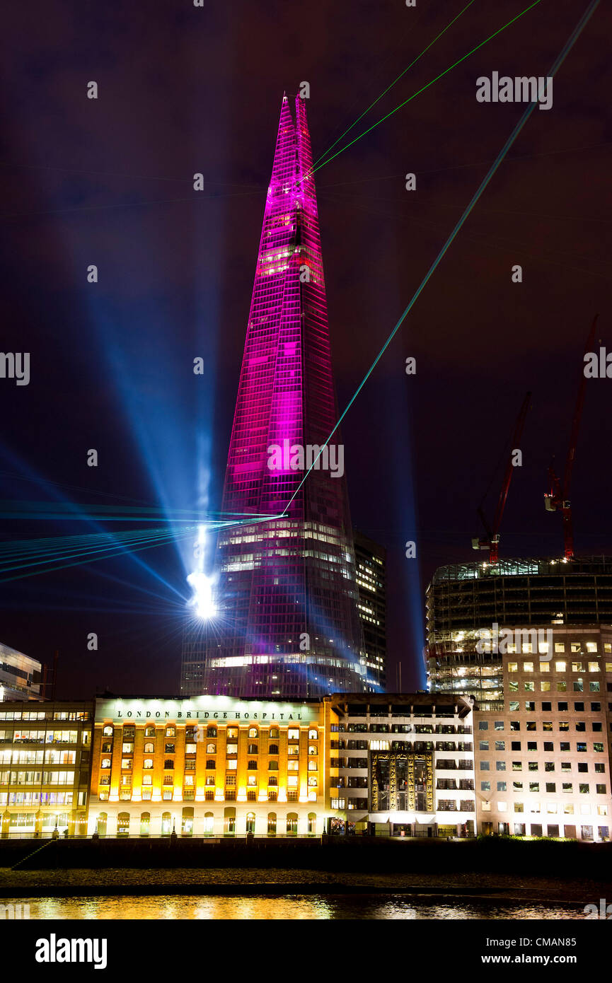 The Shard is illuminated with lasers and lights to mark its completion ...