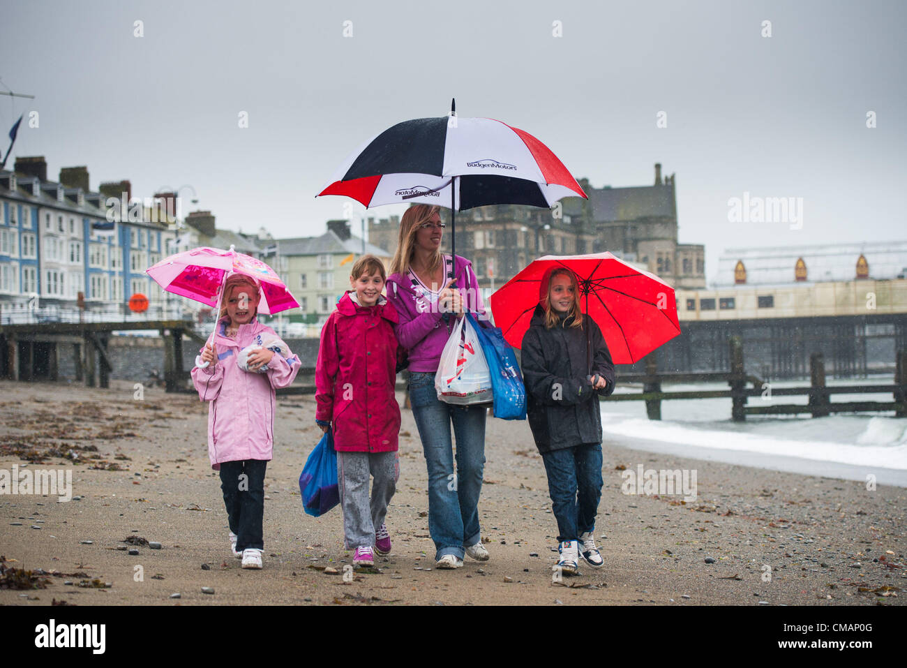 Seaside rain family hi-res stock photography and images - Alamy