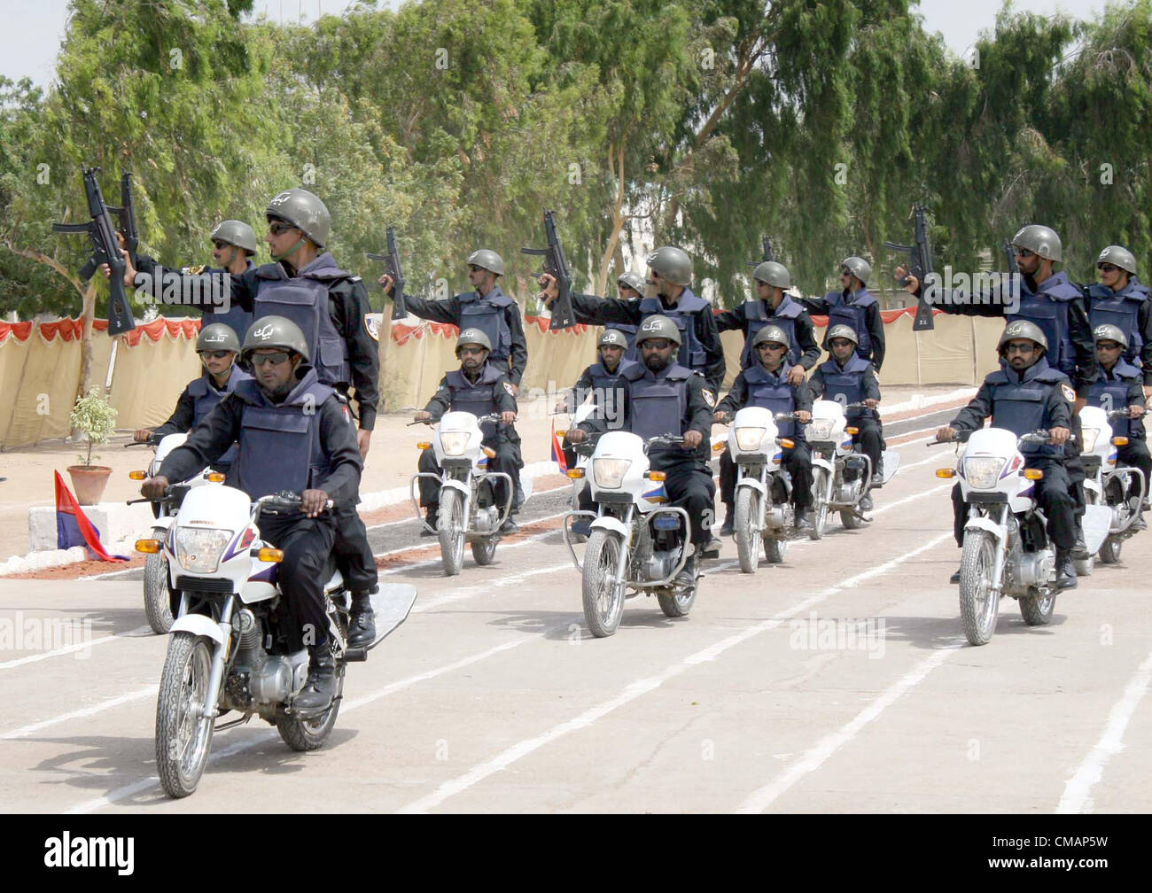 Sindh Police (SP) recruits march-past during passing out parade ...