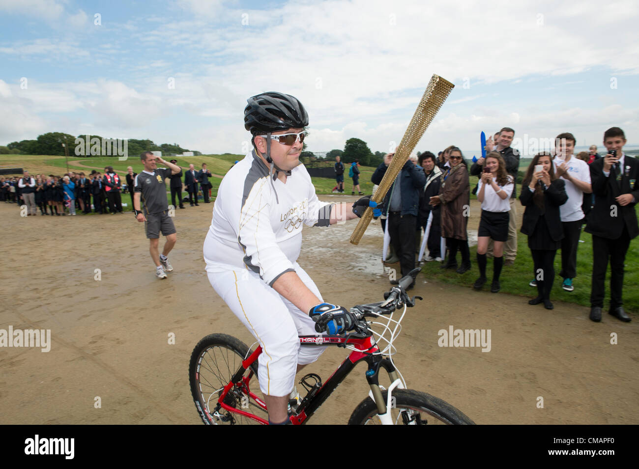 6th July 2012, Hadleigh Farm, Essex, UK. The Olympic Torch passes ...