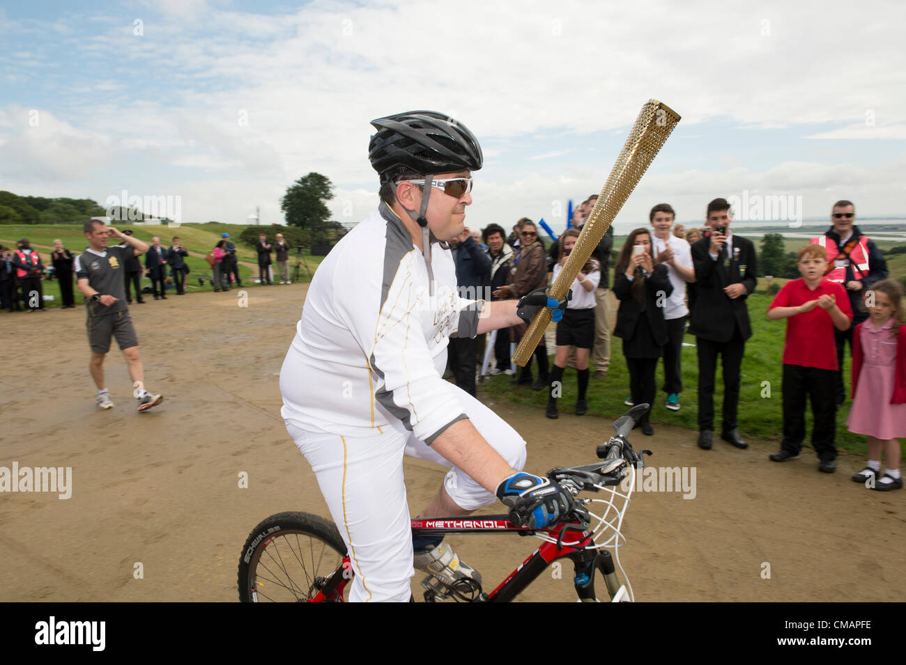 6th July 2012, Hadleigh Farm, Essex, UK. The Olympic Torch passes ...