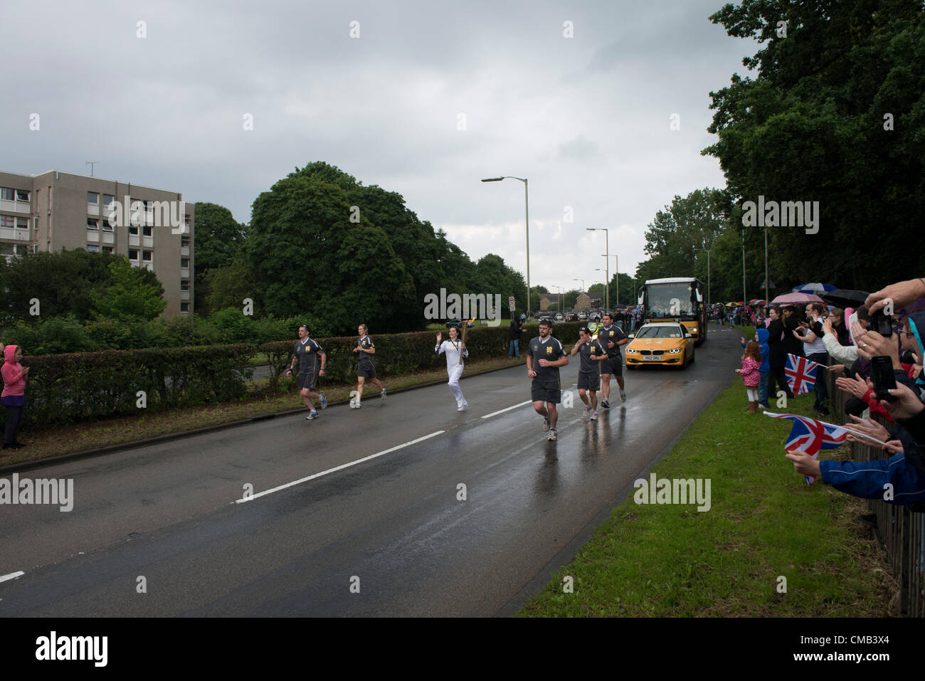 8 July 2012. Rachel Gower, 12, carries the olympic torch in St. Albans ...