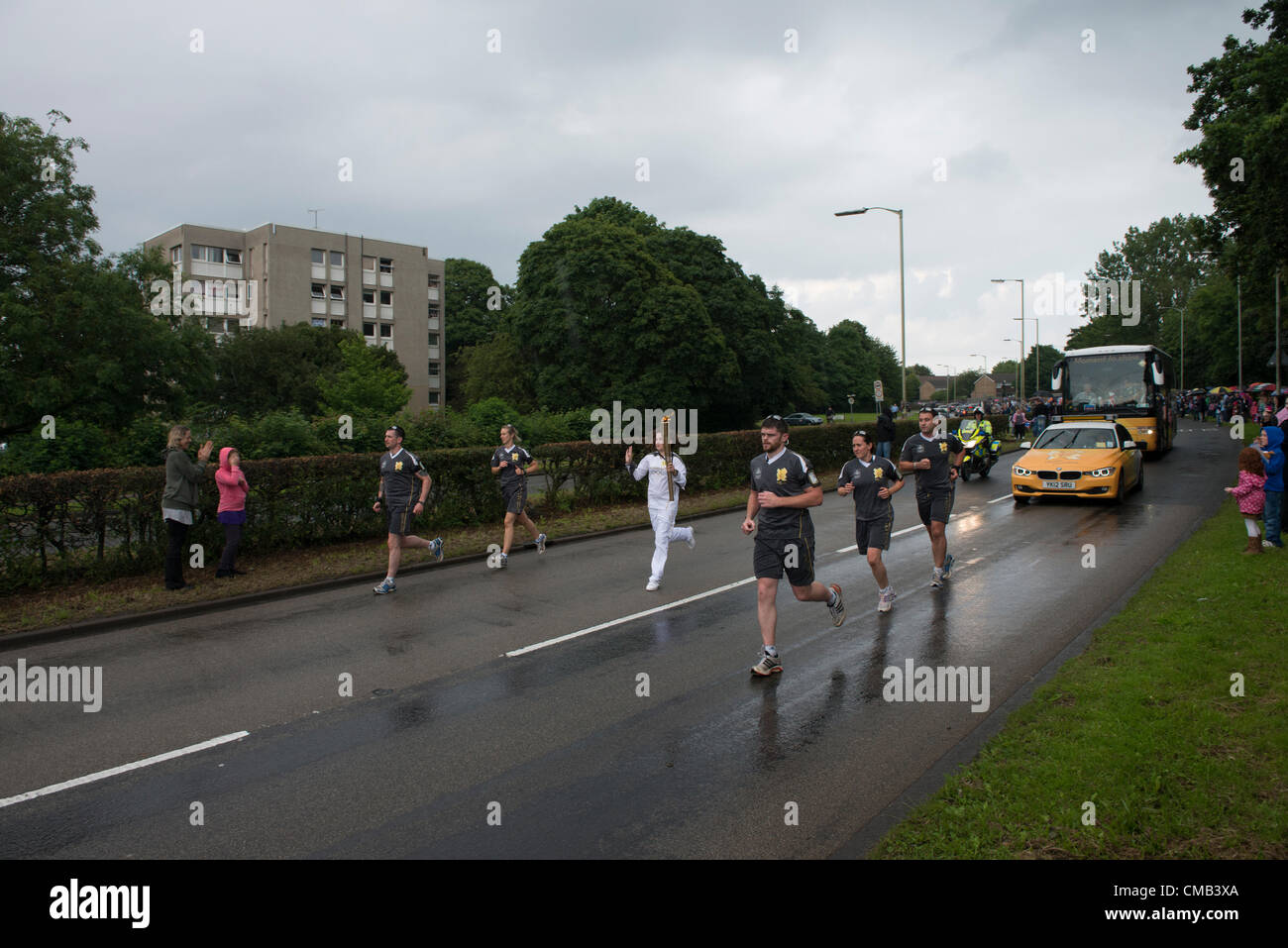 8 July 2012. Rachel Gower, 12, carries the olympic torch in St. Albans ...