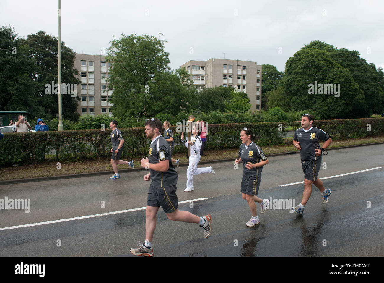 8 July 2012. Rachel Gower, 12, carries the olympic torch in St. Albans ...