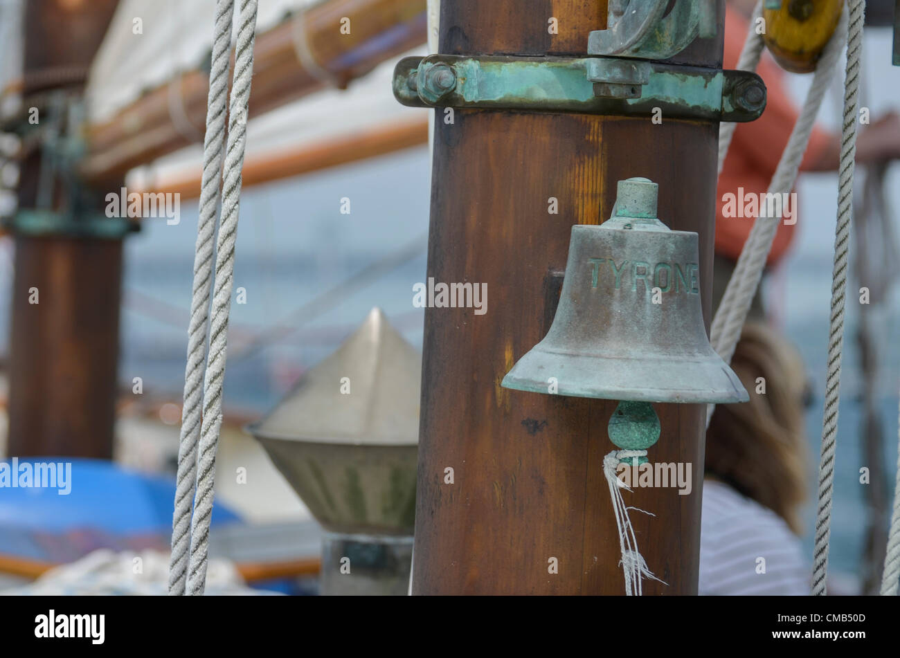 Brass bell on the tall ship schooner Tyrone during the Parade of Sail ...