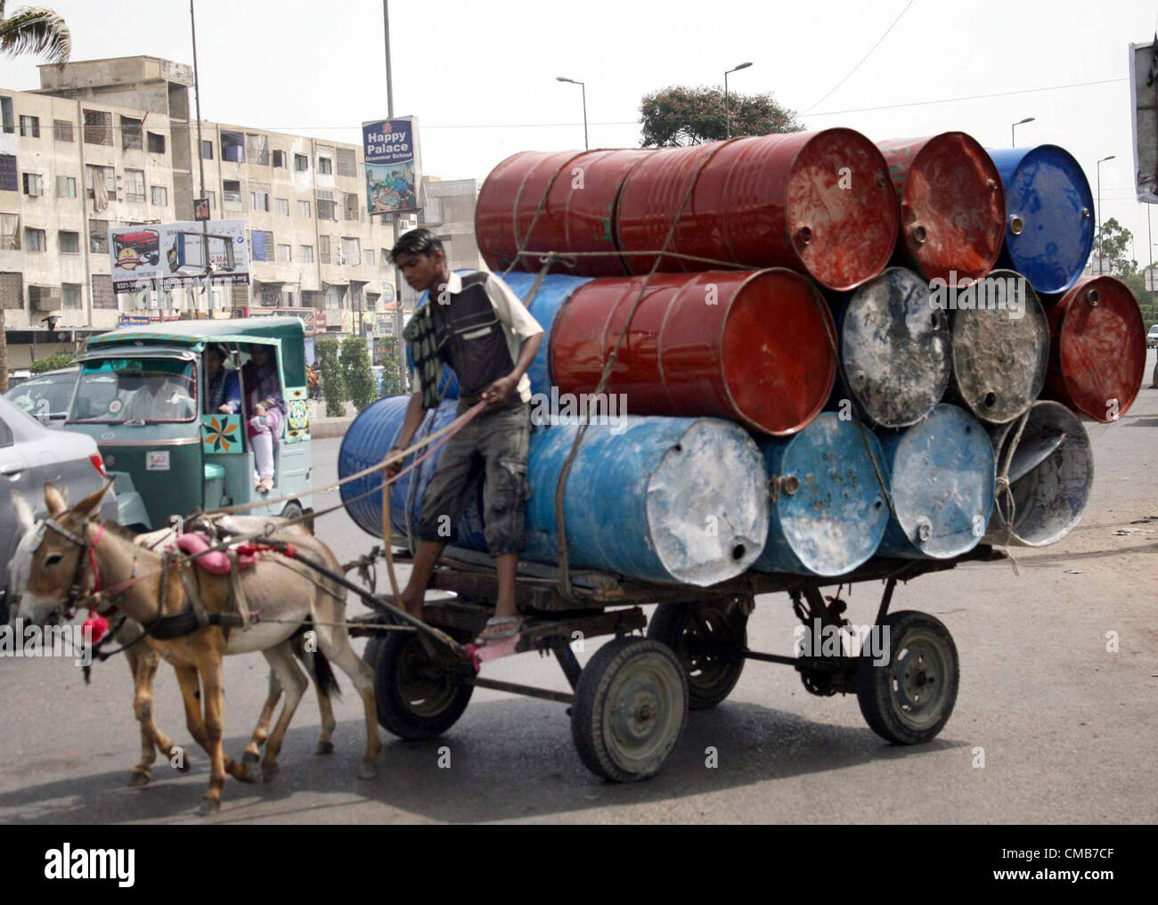 Overloaded Mule With Cart Somali Official To Residents: Flee Battle