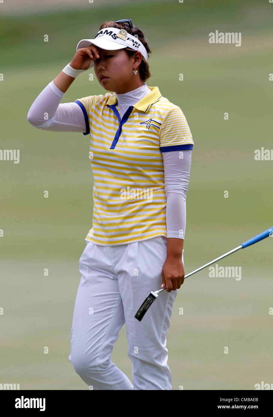 08.07.2012. Kohler, Wisconsin, USA. Jenny Shin from California walks ...