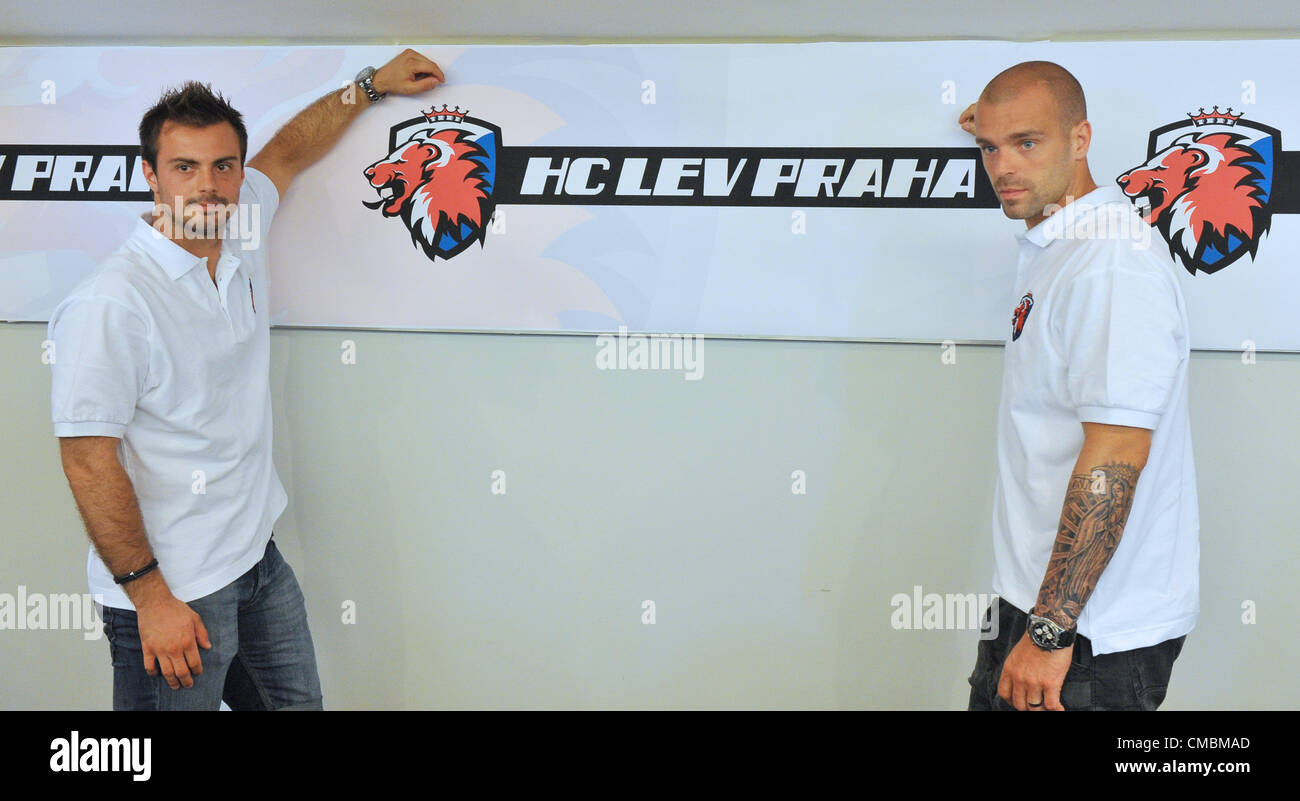 Michal Repik, left, and Jakub Klepis, players of HC Lev Prague ice ...