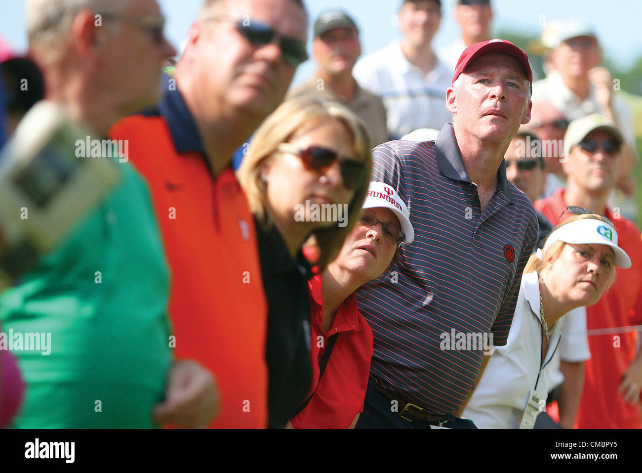 July 12, 2012 - Silvis, Iowa, U.S. - Members of the gallery turn their ...
