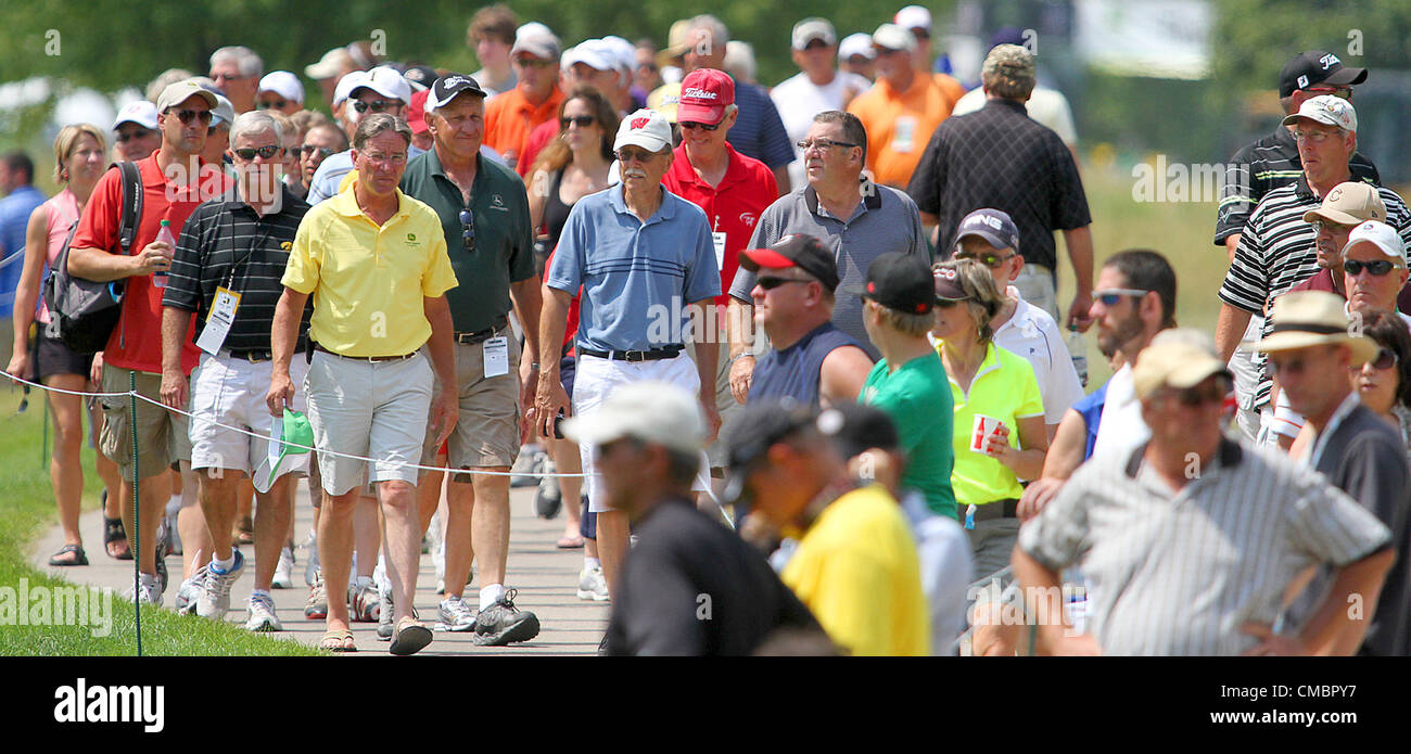 July 12, 2012 - Silvis, Iowa, U.S. - Members of the gallery follow ...
