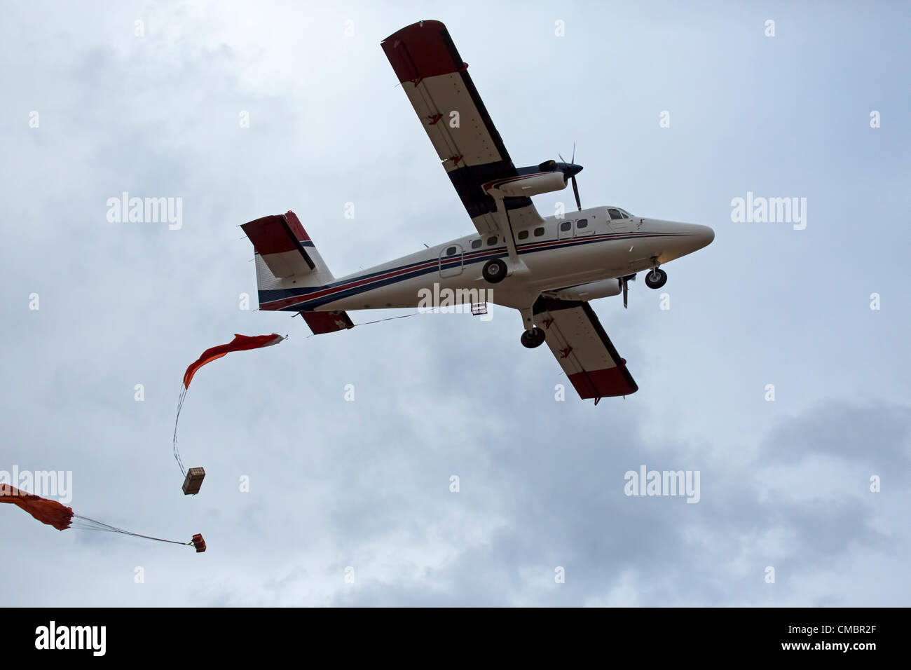 Firemen Smoke Jumpers parachute into wildfire forest fire area to start ...