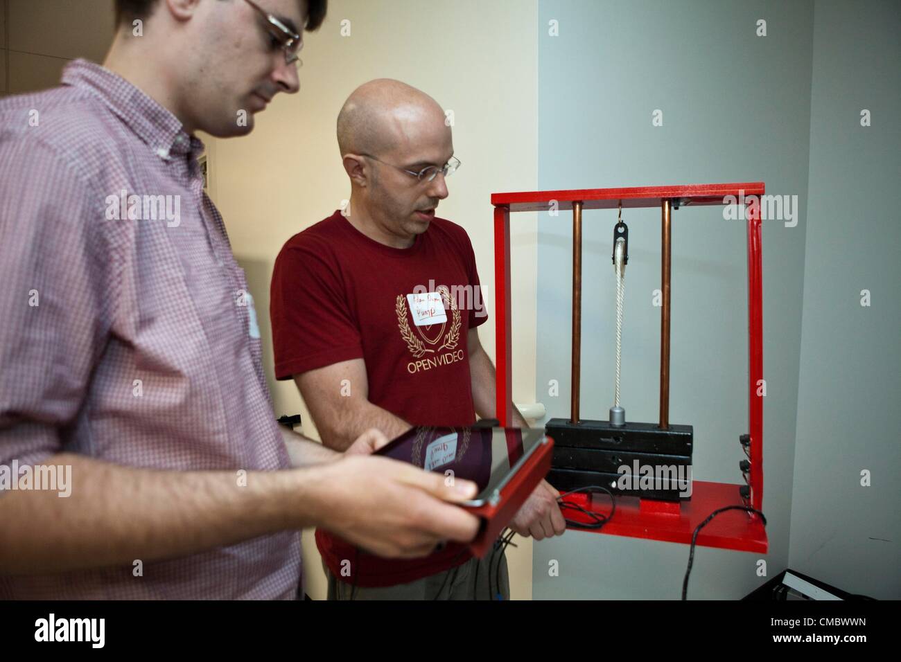July 12, 2012 - Palo Alto, California, U.S. - ALEX GOLUC, left, ADAM ...