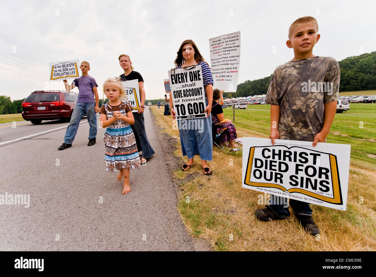 July 13, 2012 - Palmyra NY, USA - Anti-Mormon protesters hold signs ...