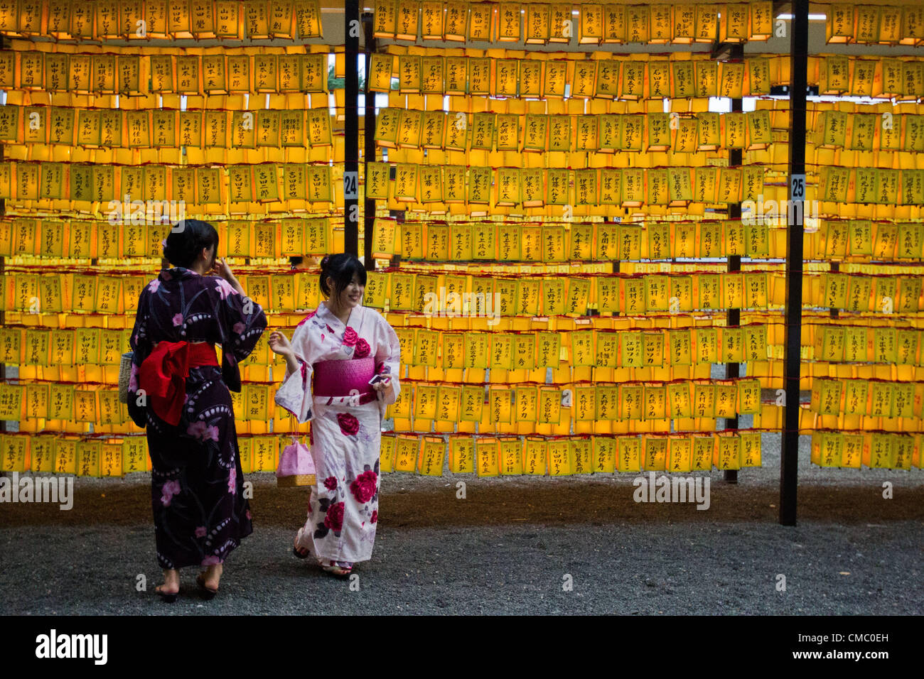 July 14, 2012 - Tokyo, Japan - Two Japanese girls dressed in yukata ...