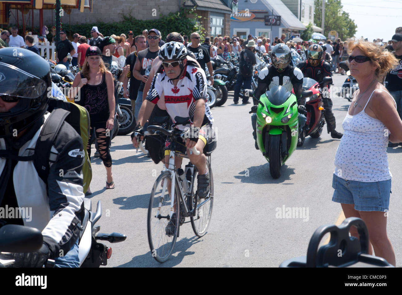 People gathering and celebrating Friday the 13th in Port Dover. Bikers ...
