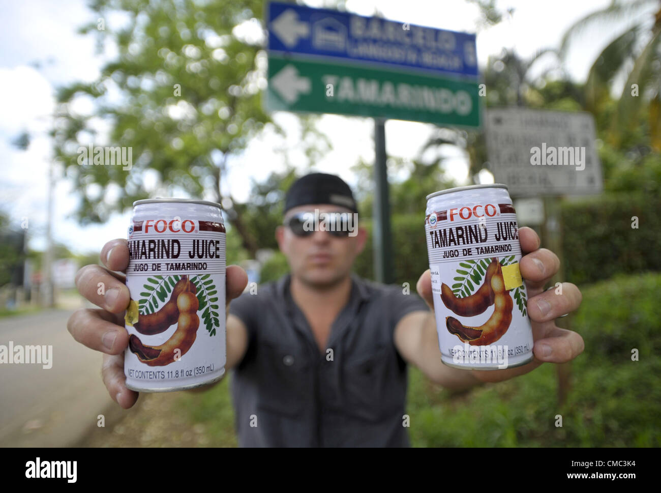 May 28, 2012 - U.S. - A man holds displays tamarind juice in front of a ...