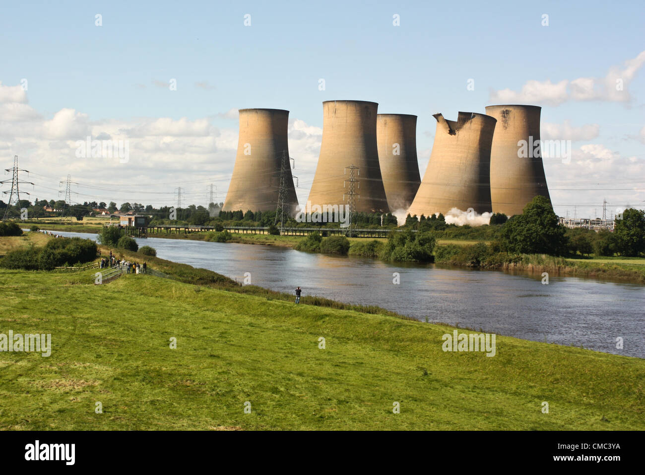 The first cooling tower begins to collapse in the demolition process at ...