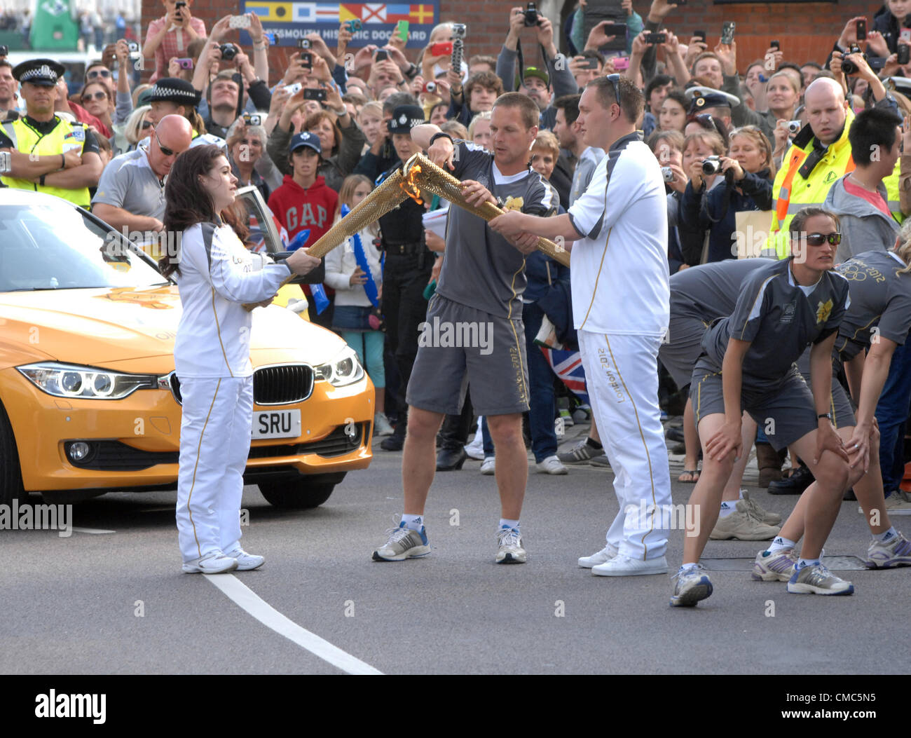 PORTSMOUTH, ENGLAND - July 15th: the torch kiss - handover - Portsmouth ...