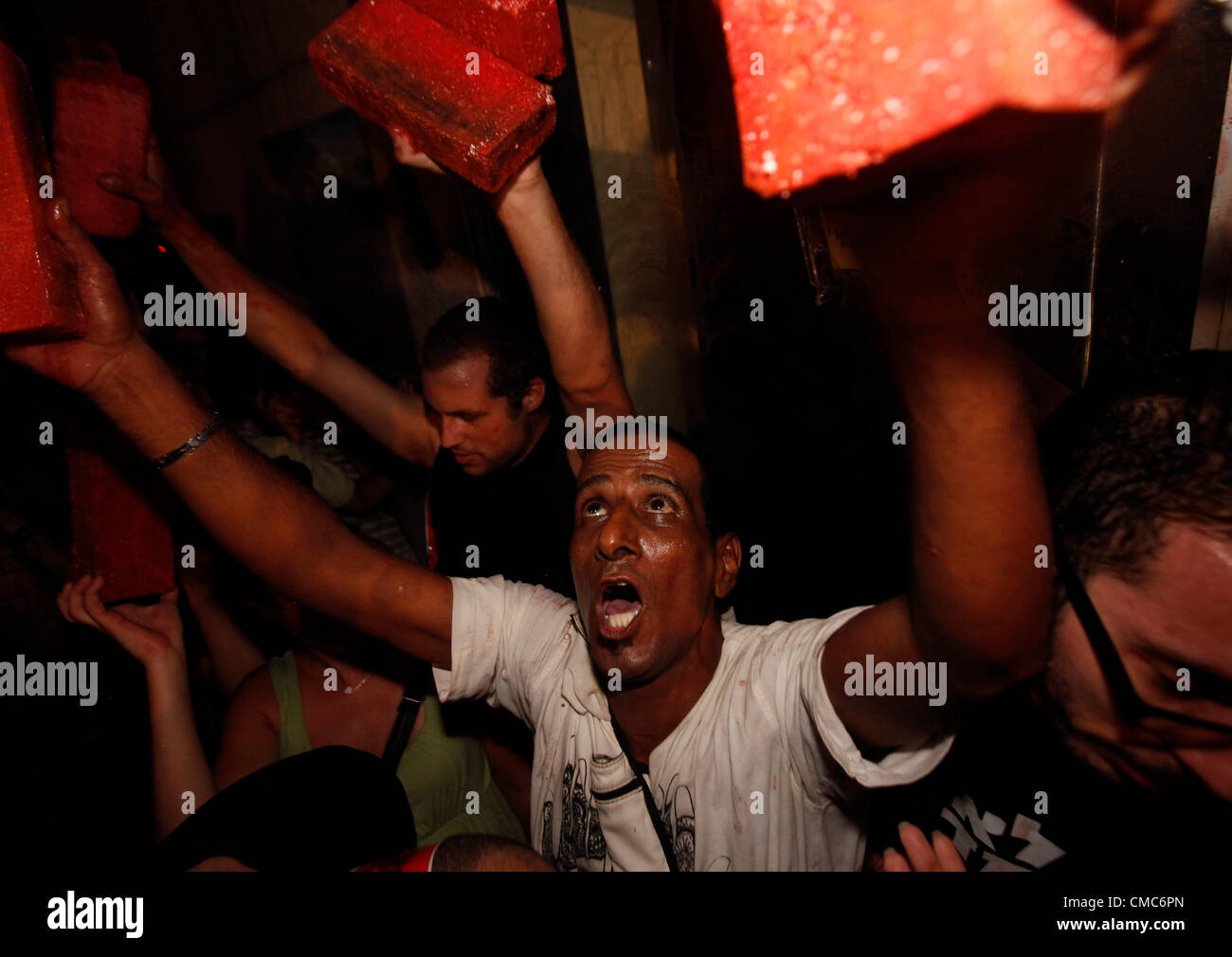 Protesters take part in a solidarity demonstration with Moshe Silman ...