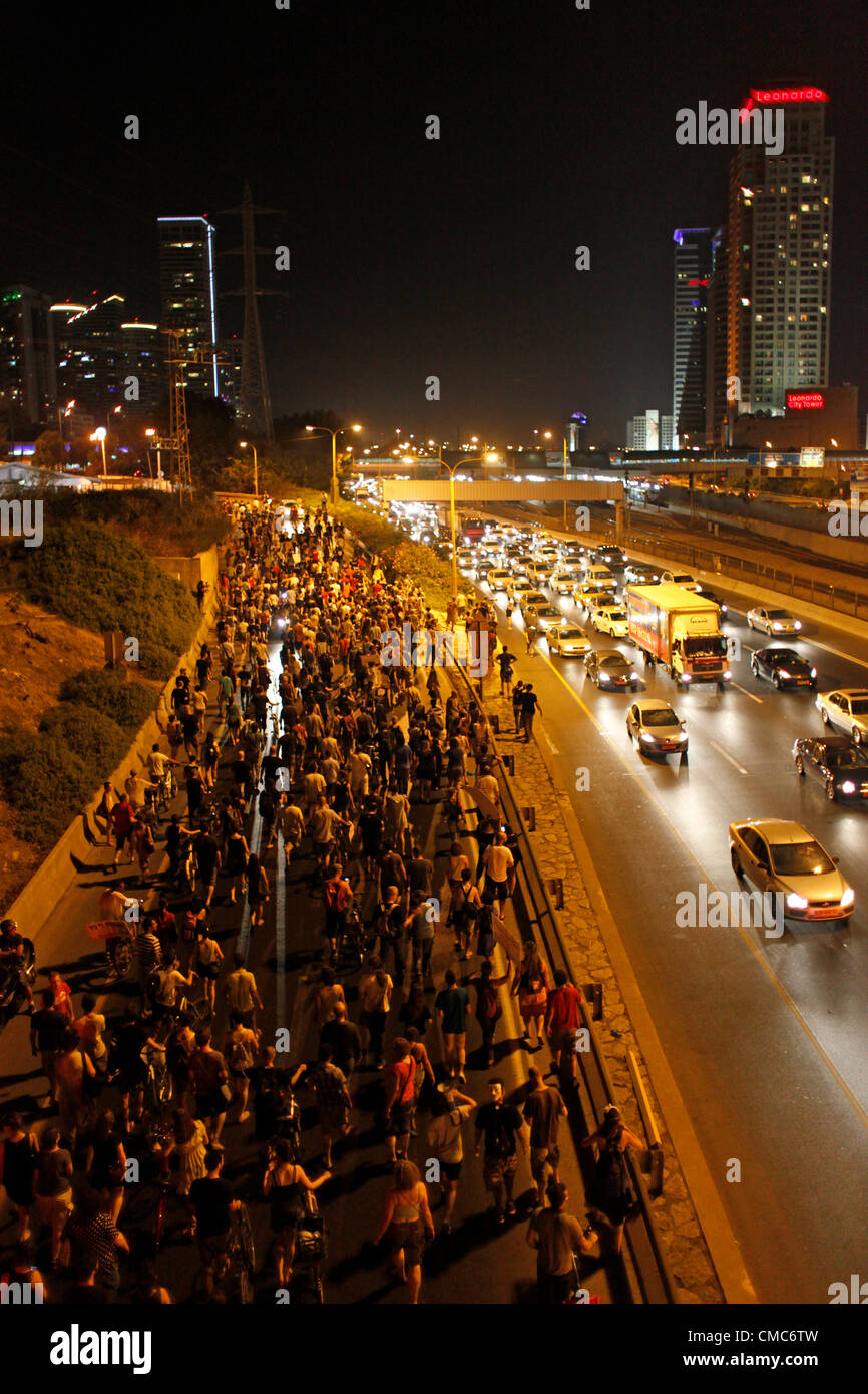 Israeli protestors march and block a motorway during a demonstration in ...