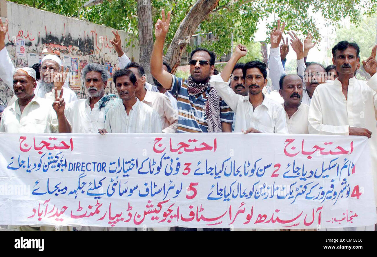 Activists of All Sindh Education Department Lower Staff chant slogans ...